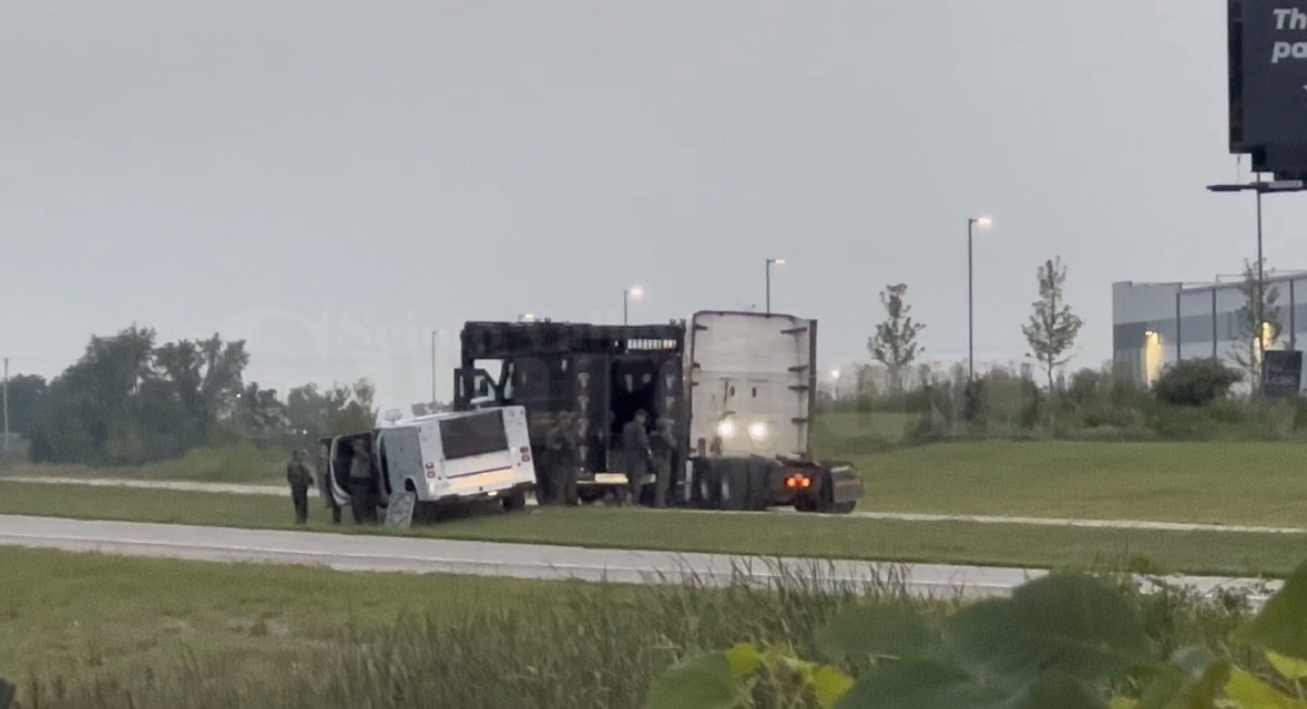 Two killed after carjacking semi, holding driver hostage following pursuit