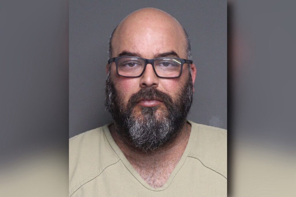 Former Waverly cop, three others arrested in federal raid