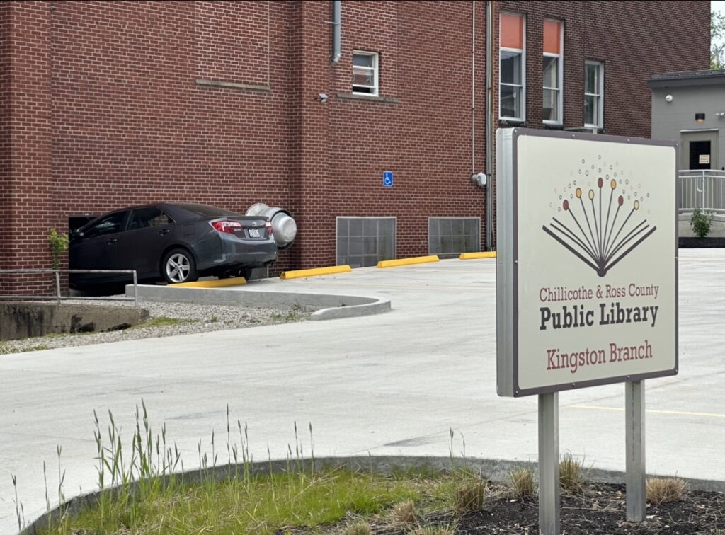 One injured after car crashes into building behind Ross Co. library