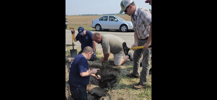 Crews team-up to save dog and groundhog in rural pipe